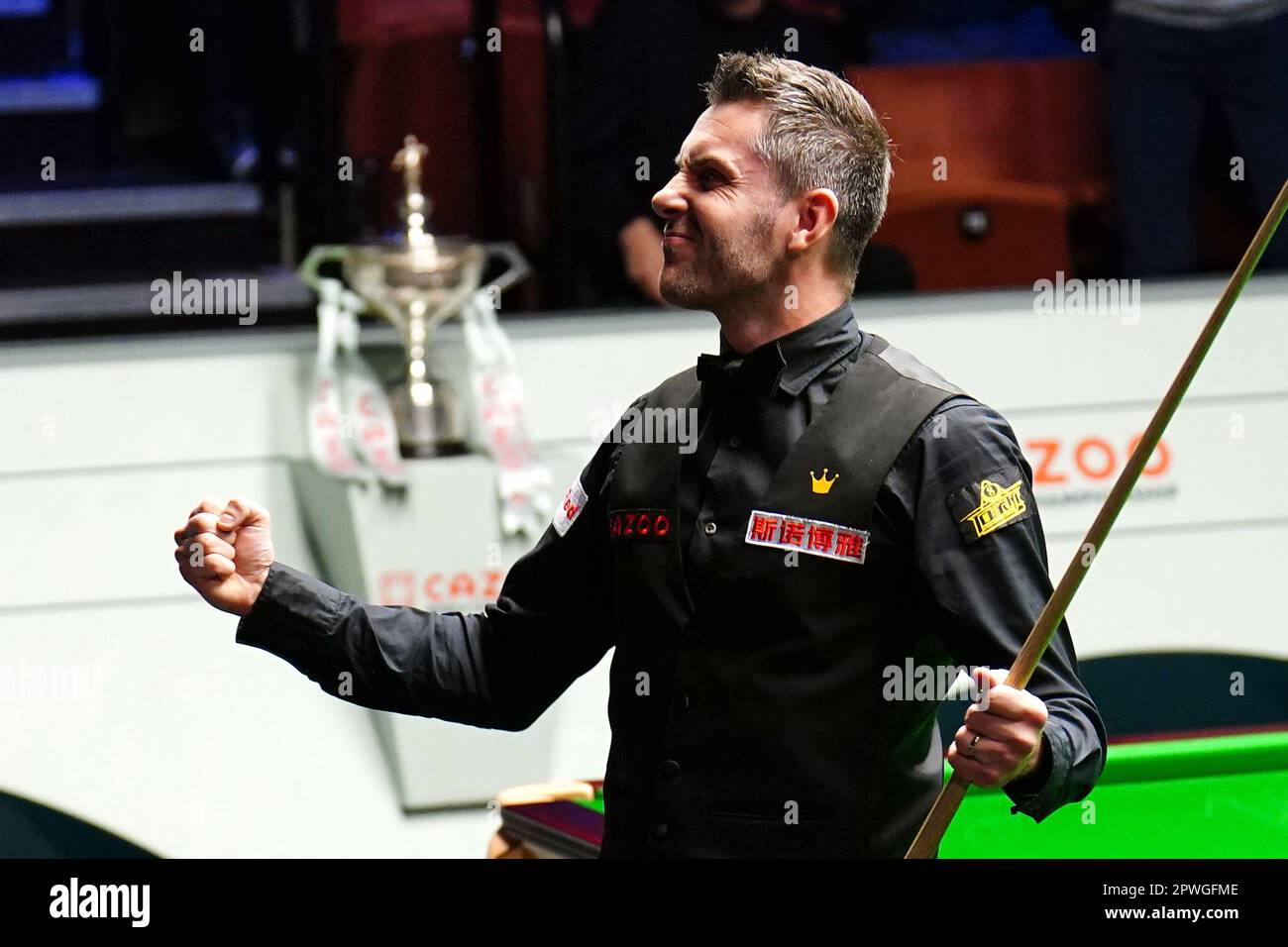 Mark Selby reacts after making a 147 against Luca Brecel (not pictured ...