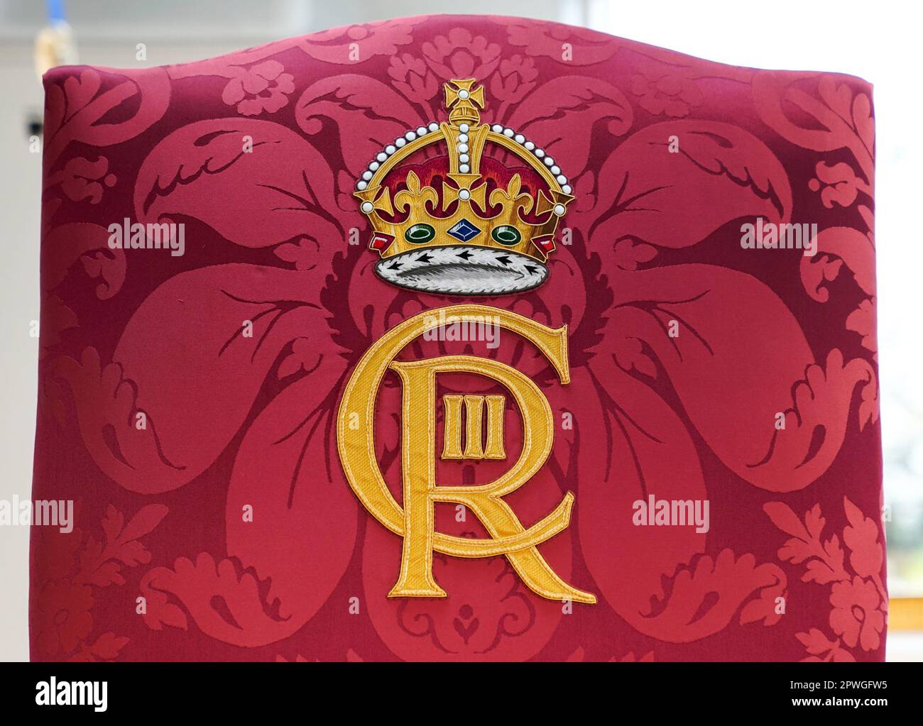 A detailed view of the Royal cypher on the Chair of Estate for King ...