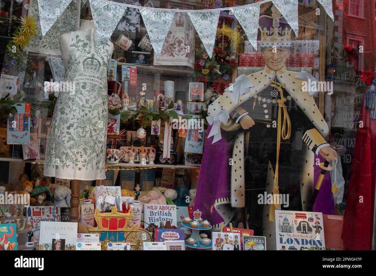 London, UK. 30th Apr 2023. The King looks out of a shop window which ...