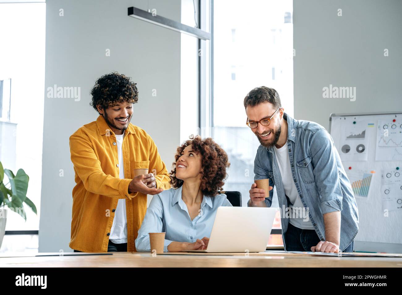 Creative business team, successful people of different nationalities, working together on a ...