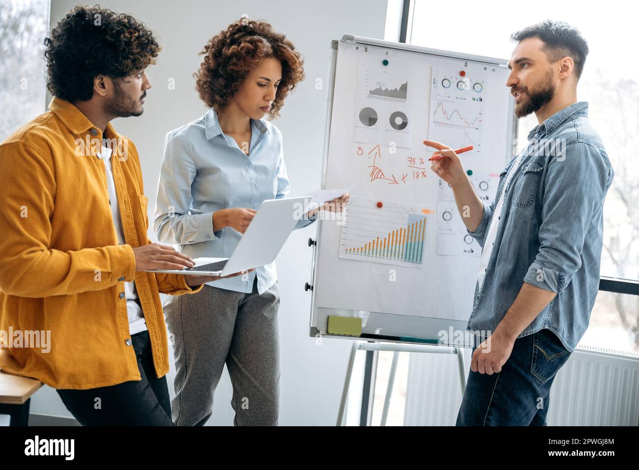 Brainstorming. Successful creative coworkers are working together on a ...