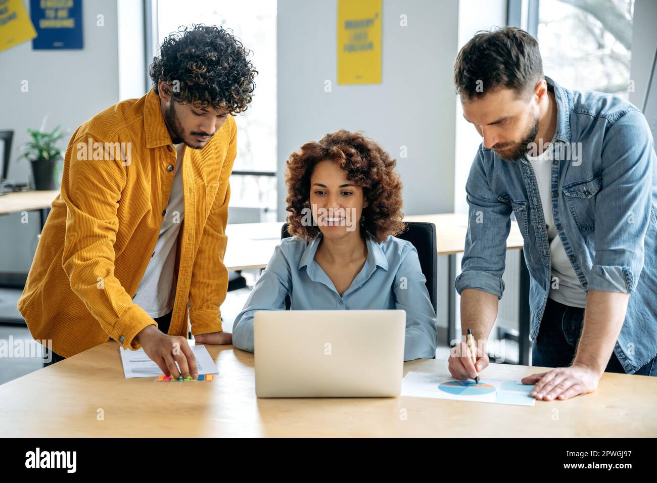 Successful people of different nationalities, creative business team, working together on a ...