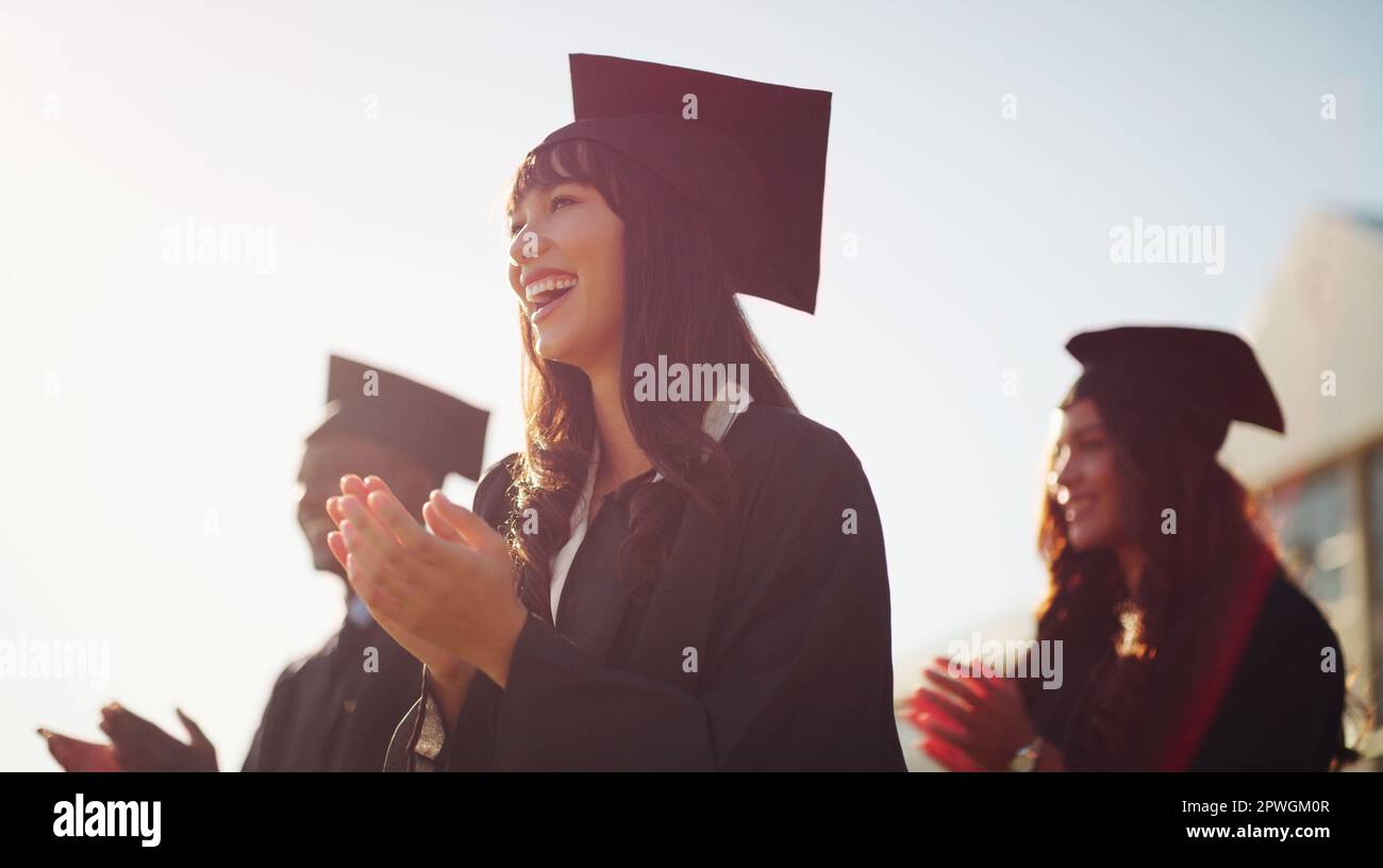 Congratulations to all of you. a group of cheerful young students ...