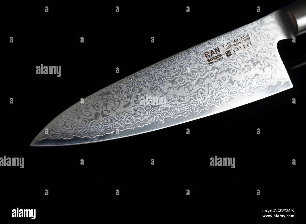 A traditional premium Japanese chef's knife manufactured with layer ...