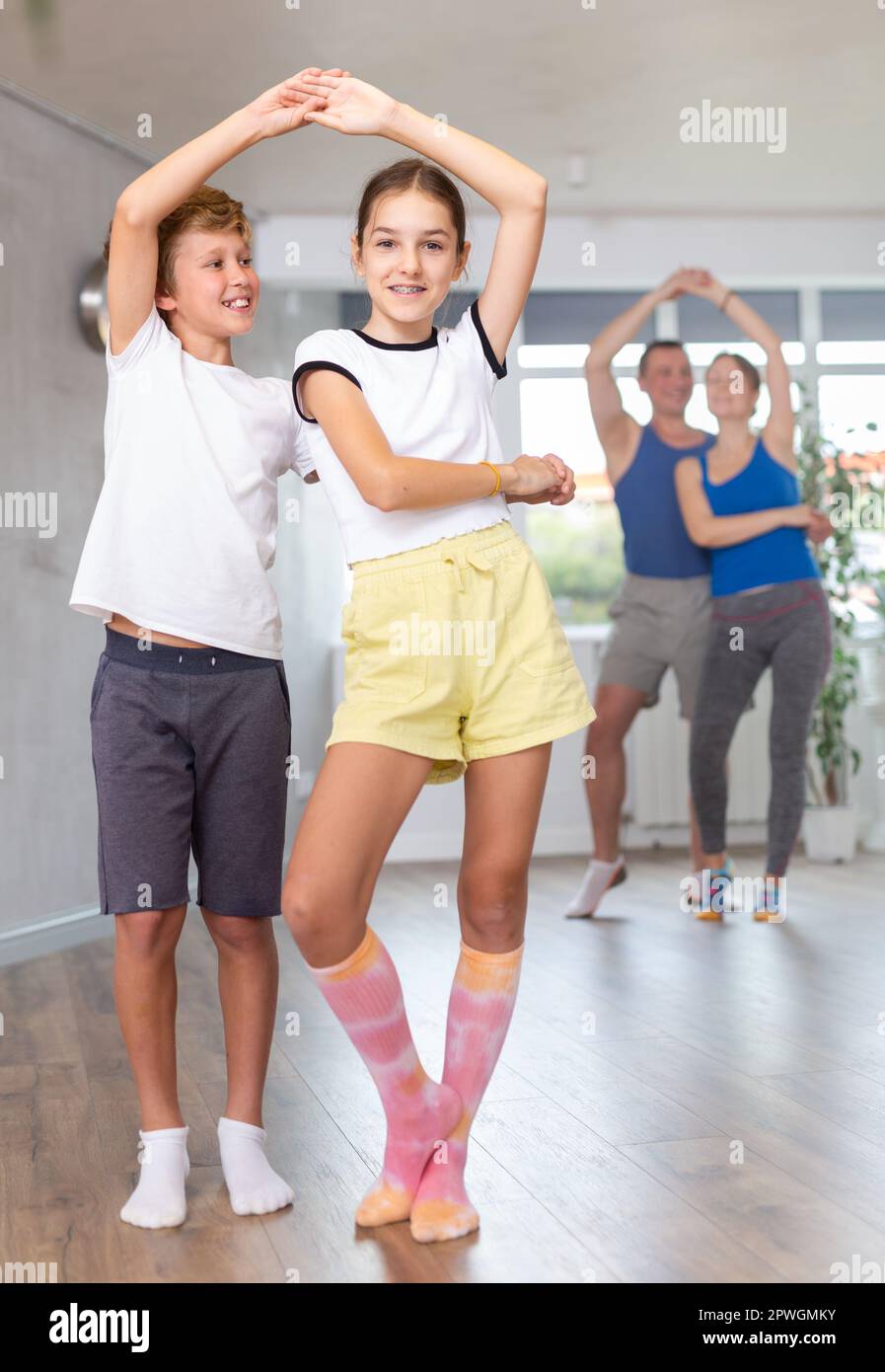 Mother father children school sport hi-res stock photography and images ...