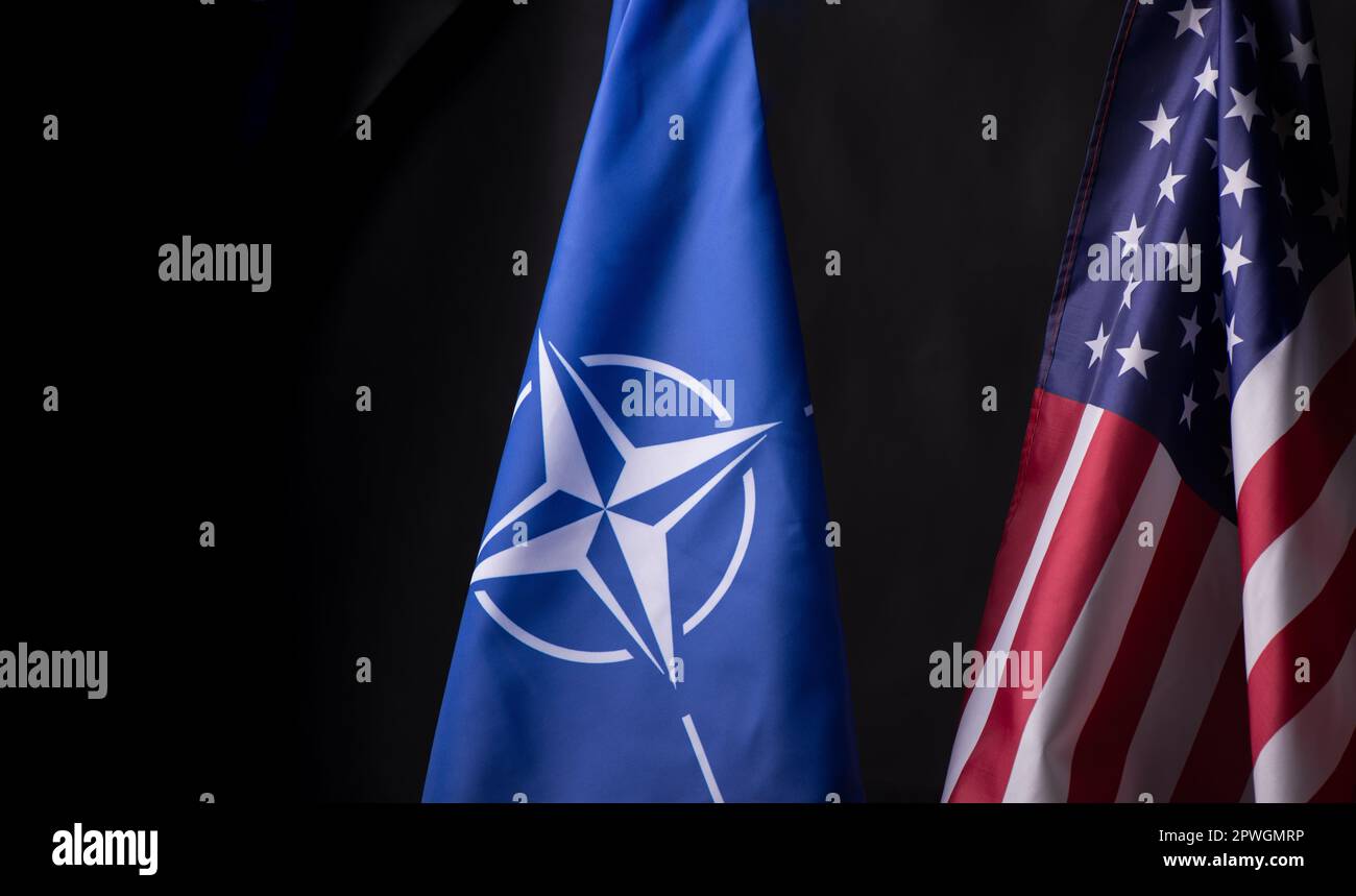 Ukraine, Kyiv - 10.04.2023. Official Flags of the US and NATO, symbols ...