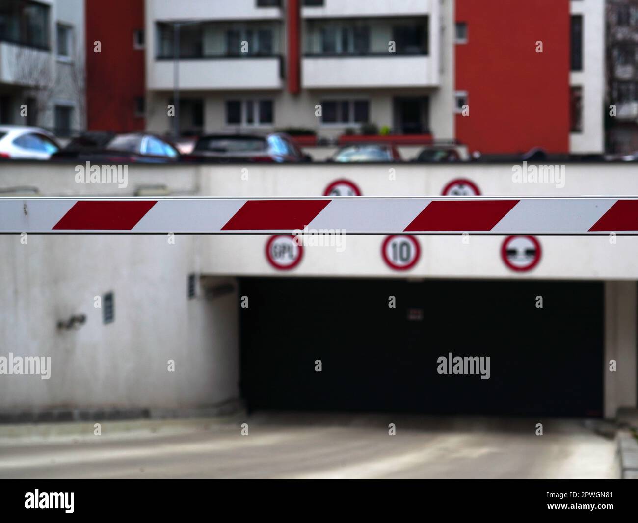 Automatic barrier toward private underground parking lot serving a ...