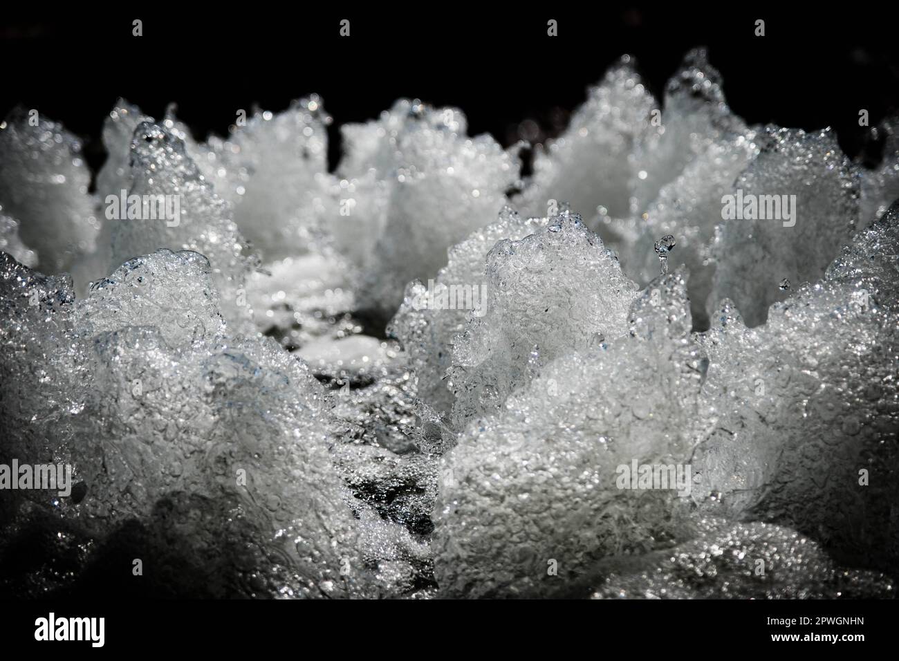 Bubbling and splashing water up close in glittering sunlight Stock ...