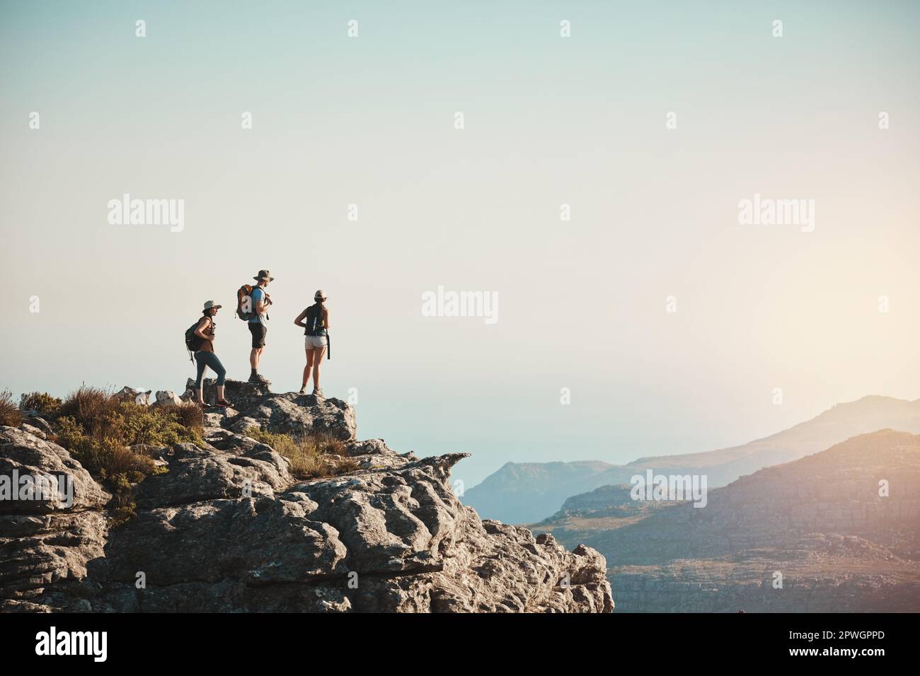 No time is ever wasted spent in nature. a group of friends hiking up a ...