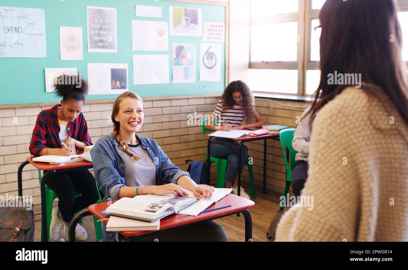 They love this class. a cheerful young teacher giving class to a group ...