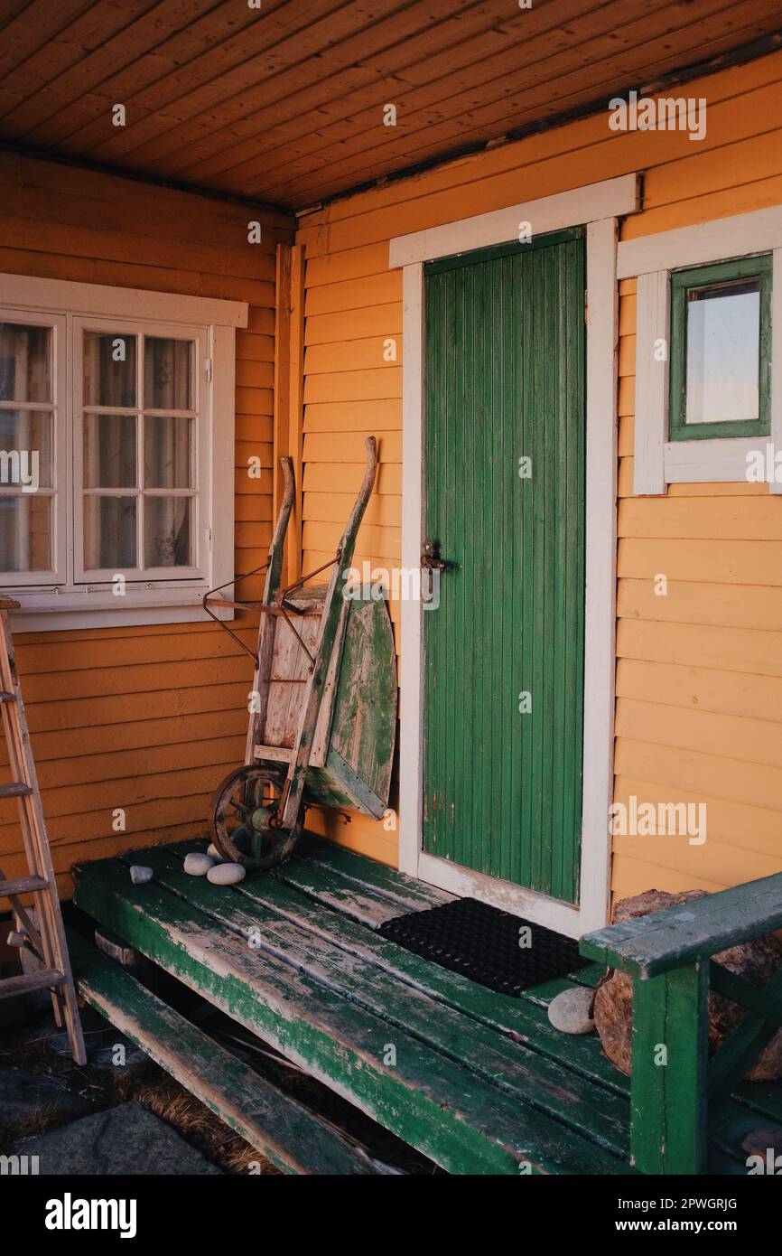 yellow wooden cabin in a sunset light Stock Photo - Alamy