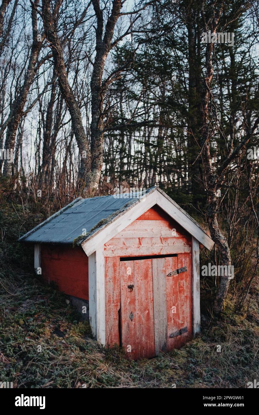 Details of Tiny red wooden cabin in a sunset light Stock Photo - Alamy