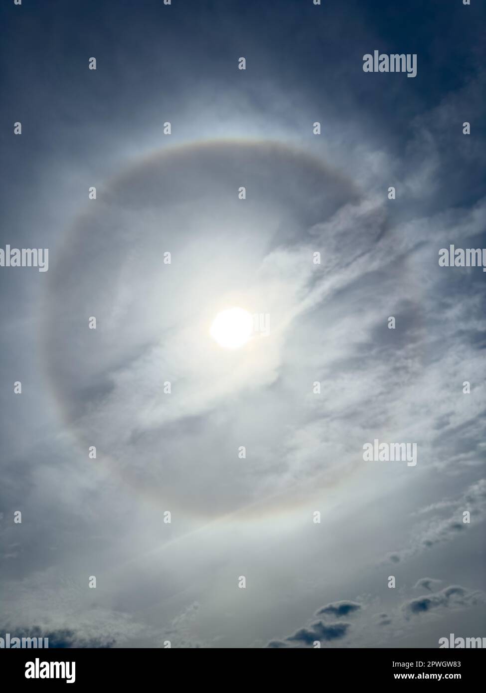 Sun halo occurring due to ice crystals in atmosphere. Solar phenomenon ...