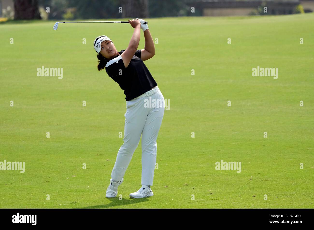 Hae Ran Ryu watches her approach shot to the third green during the final round of the LPGA LA ...