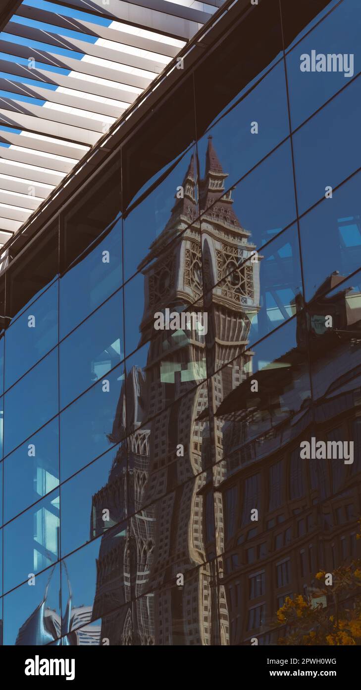 Reflection of the tower on the window of an office building Stock Photo ...