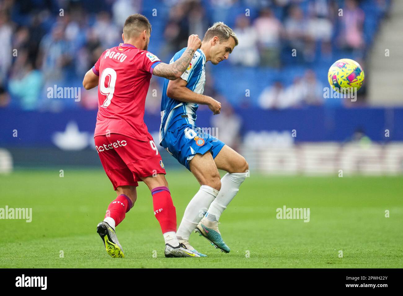 Denis Suarez of RCD Espanyol and Cristian Portugues Portu of Getafe CF ...