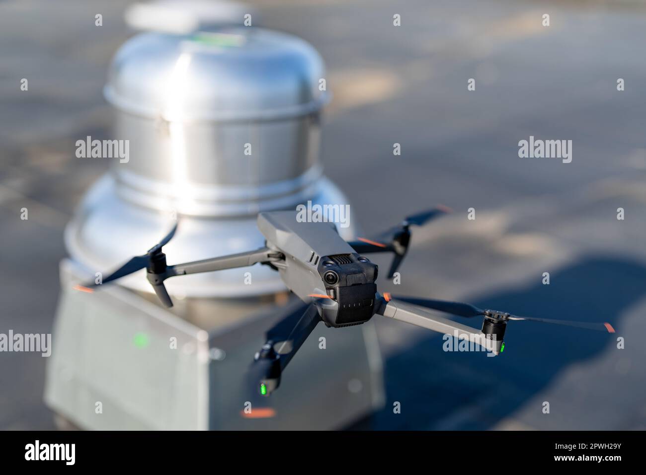Drone being used to perform an aerial inspecting of HVAC RTU equipment ...