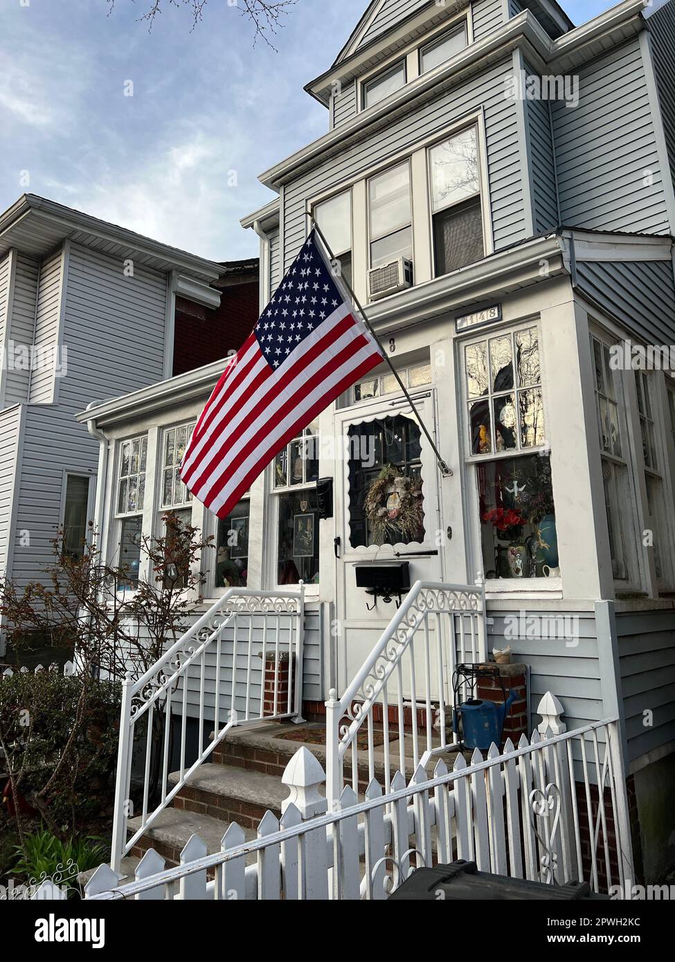 Frame house in a Brooklyn residential neighborhood displaying the ...