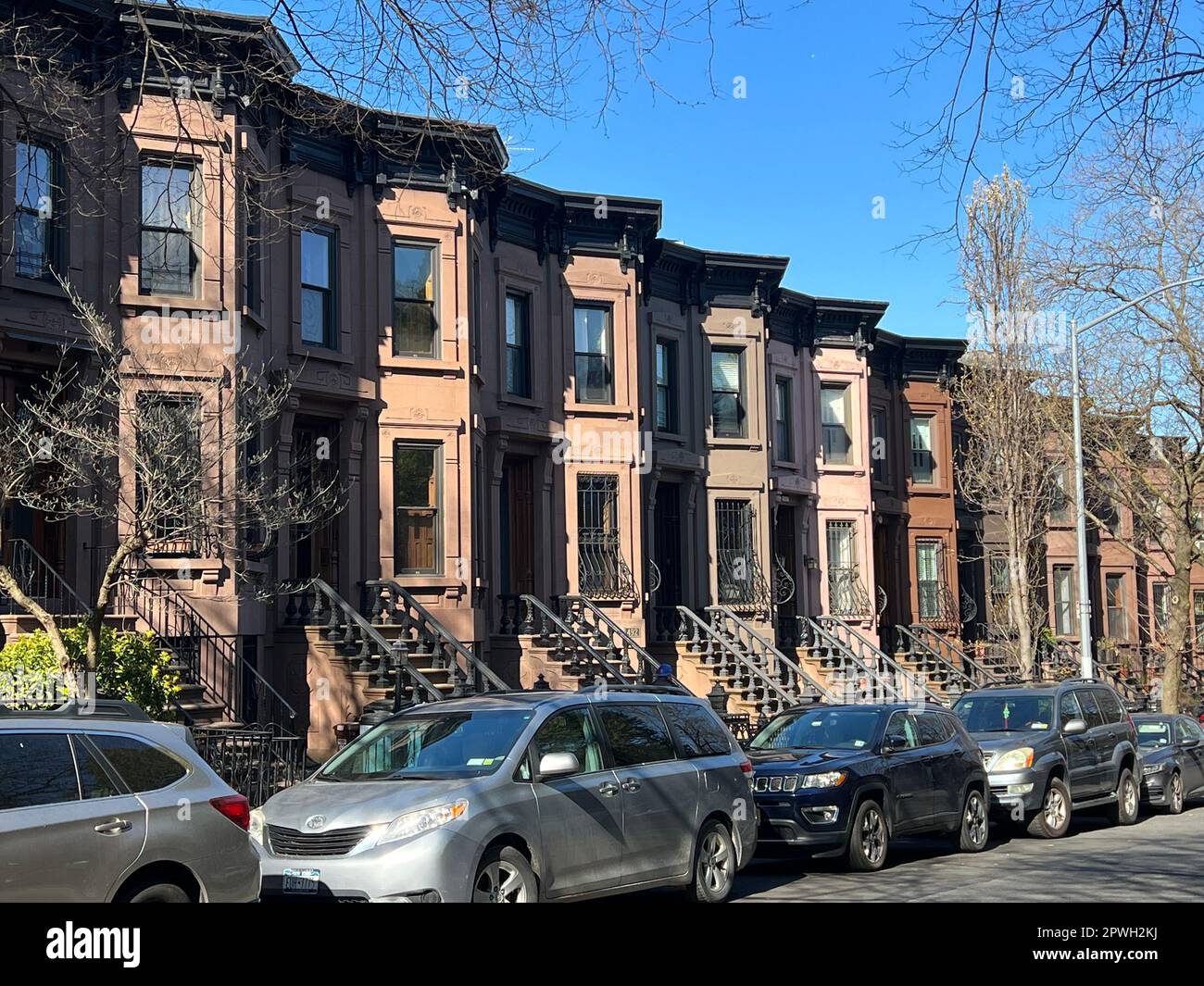 Row of classic high stoop brownstone apartment buildings in the Park ...