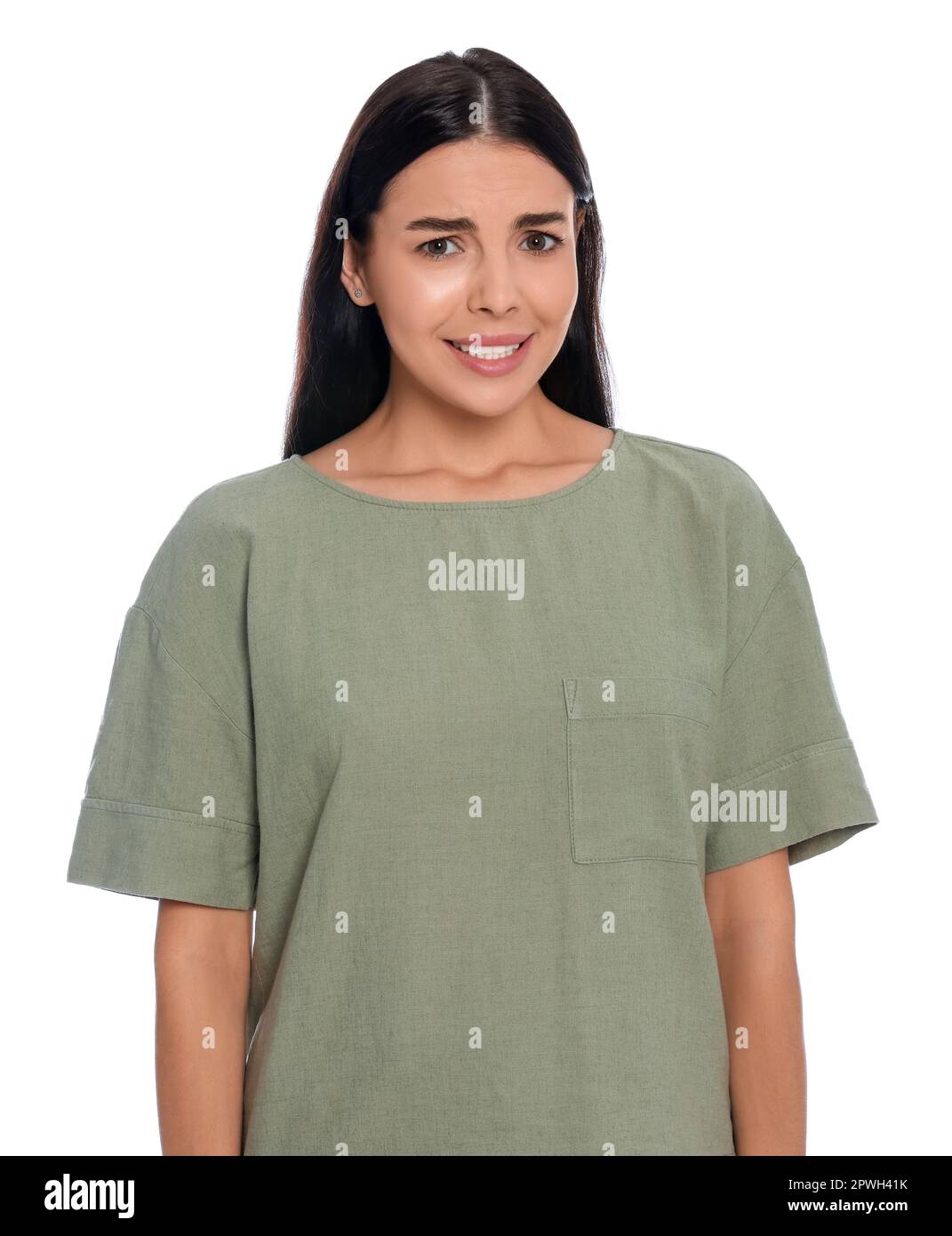 Embarrassed young woman in shirt on white background Stock Photo - Alamy