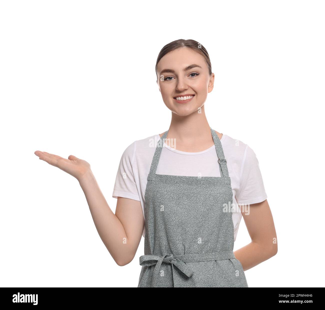 Beautiful young woman in clean apron on white background Stock Photo ...