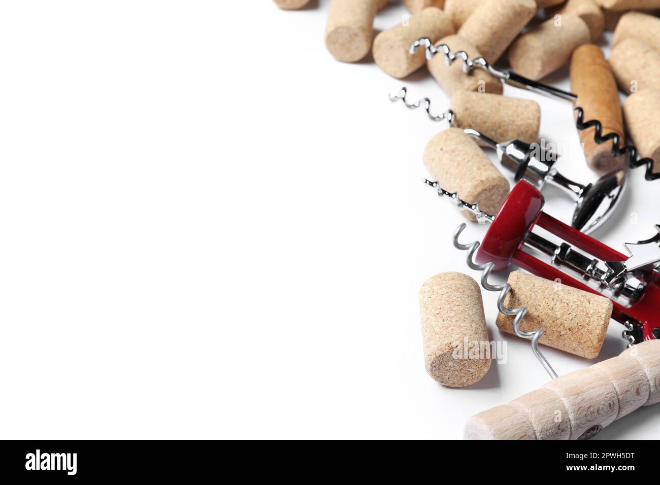 Different corkscrews and wine bottle stoppers on white background Stock ...