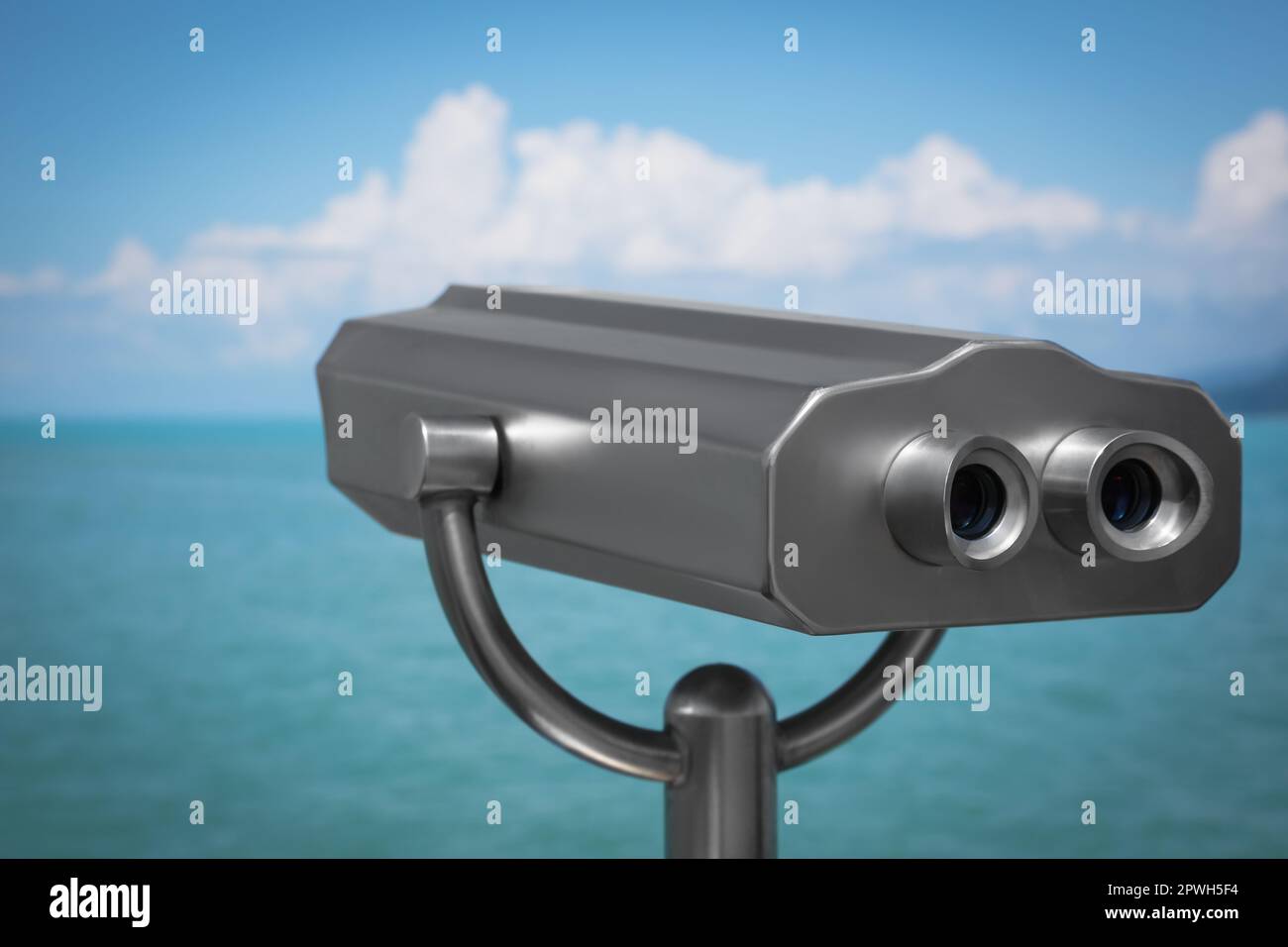 Metal tower viewer installed near sea. Mounted binoculars Stock Photo ...