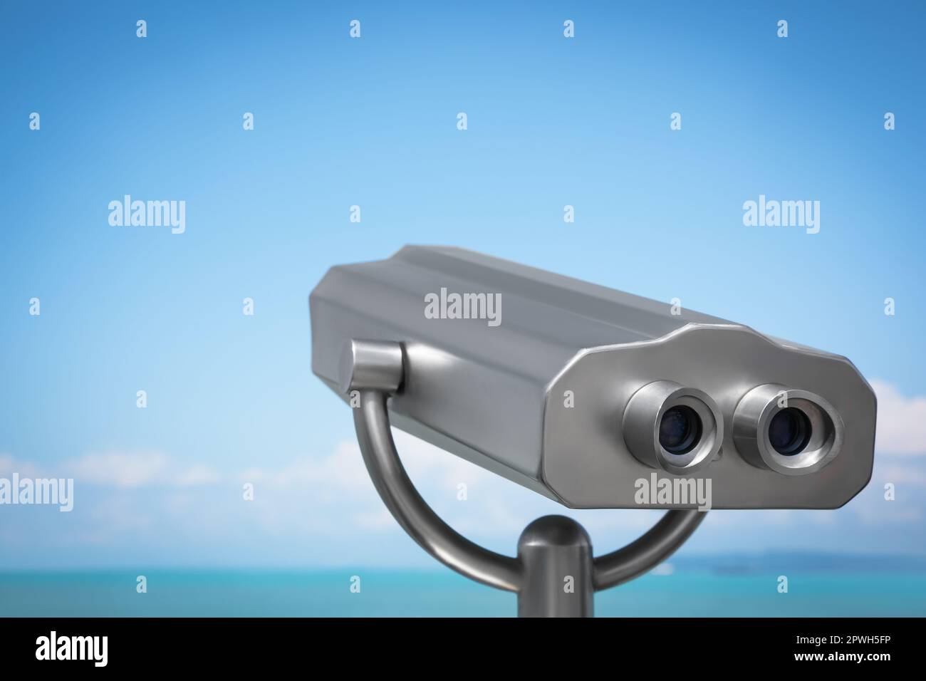 Metal tower viewer installed near sea. Mounted binoculars Stock Photo ...