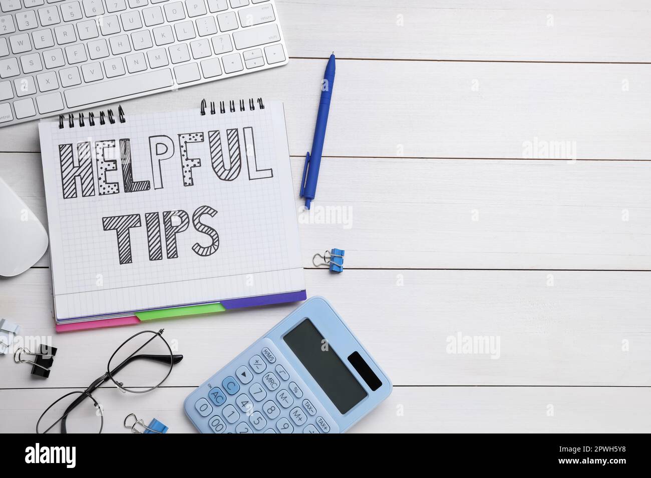 Helpful Tips. Flat lay composition with notebook, calculator and ...