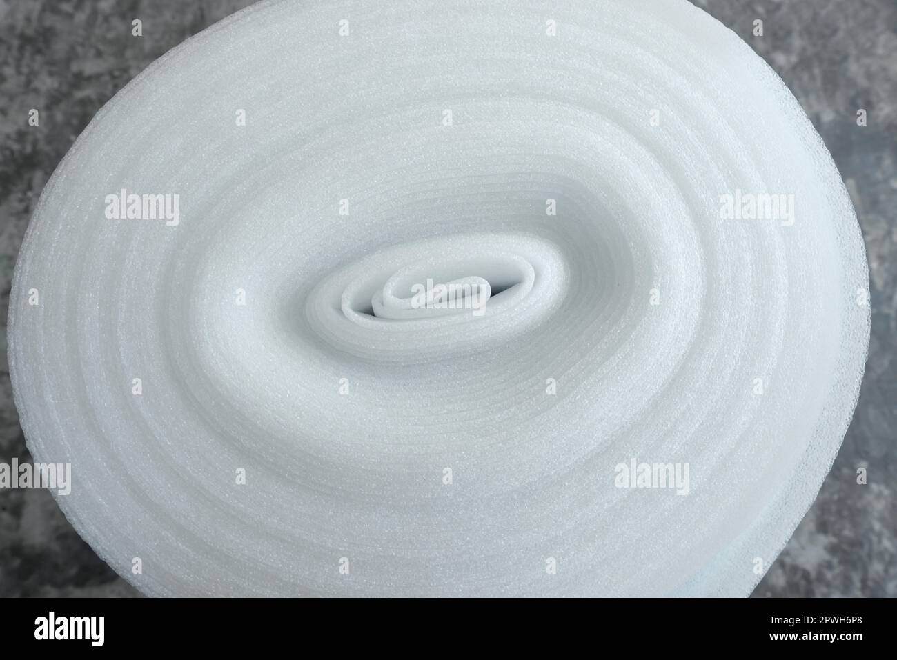 Polyethylene foam roll on gray background, above view Stock Photo - Alamy