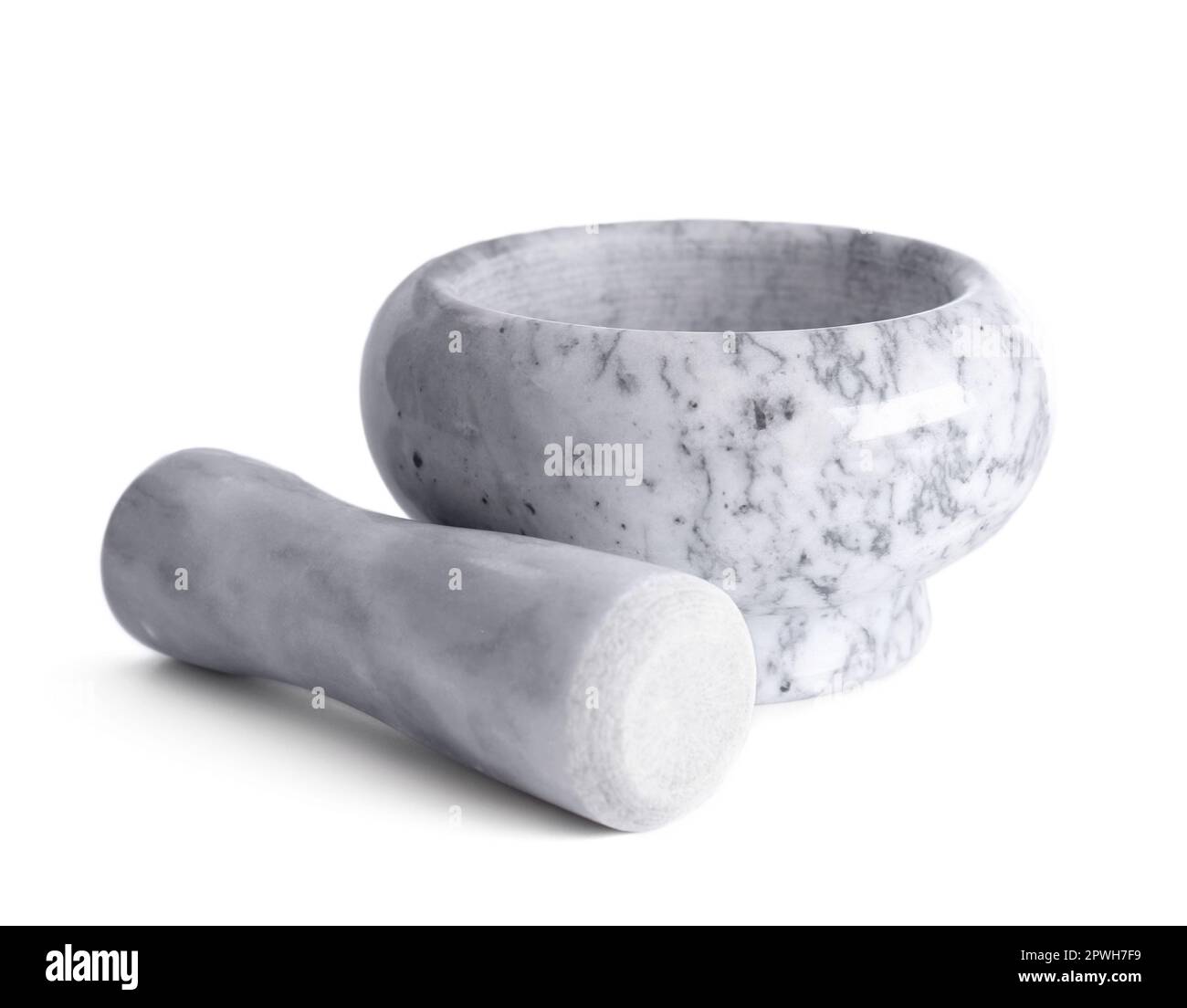 Marble mortar and pestle on white background Stock Photo - Alamy