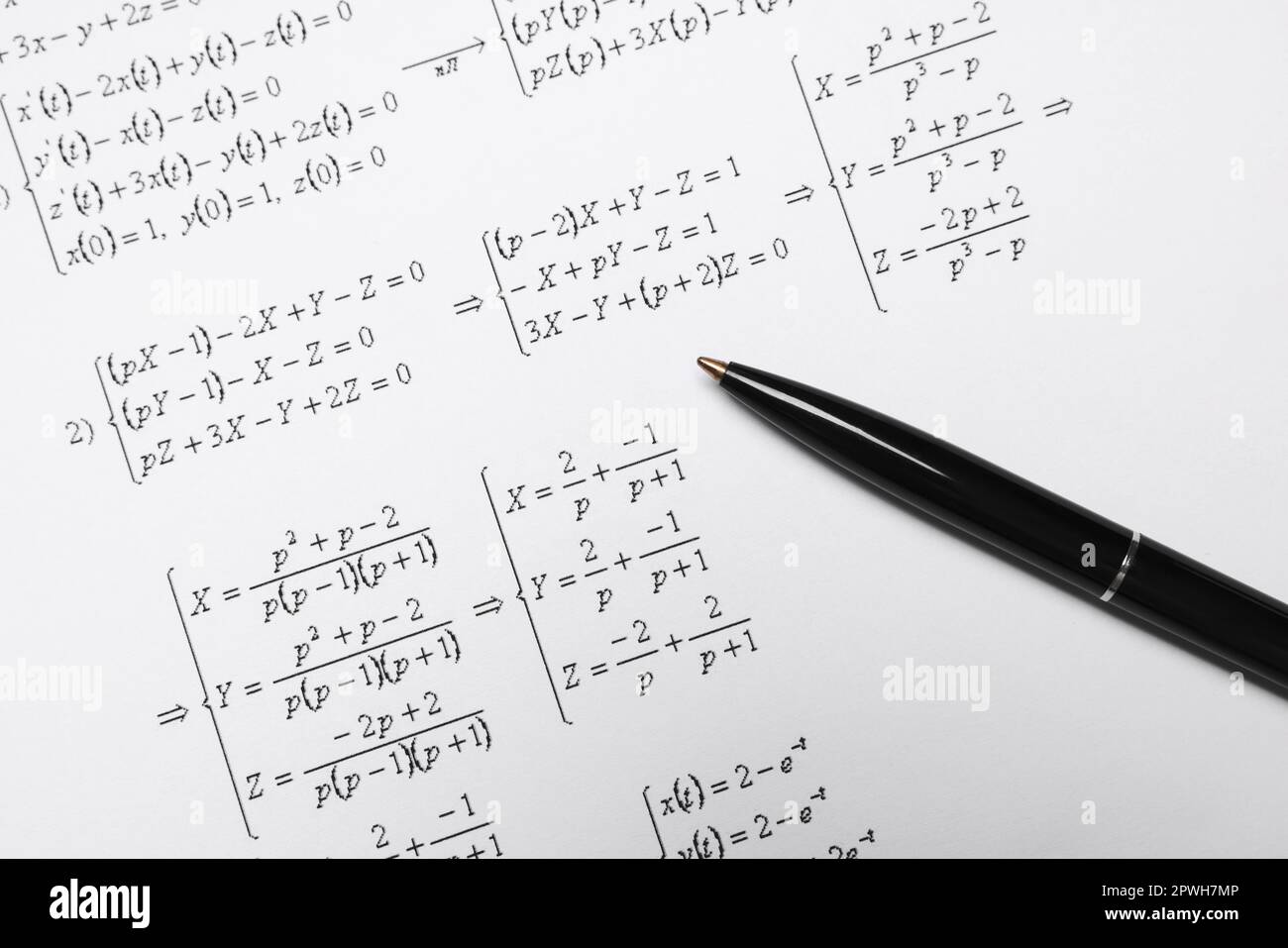 Sheet of paper with mathematical formulas and pen, top view Stock Photo ...
