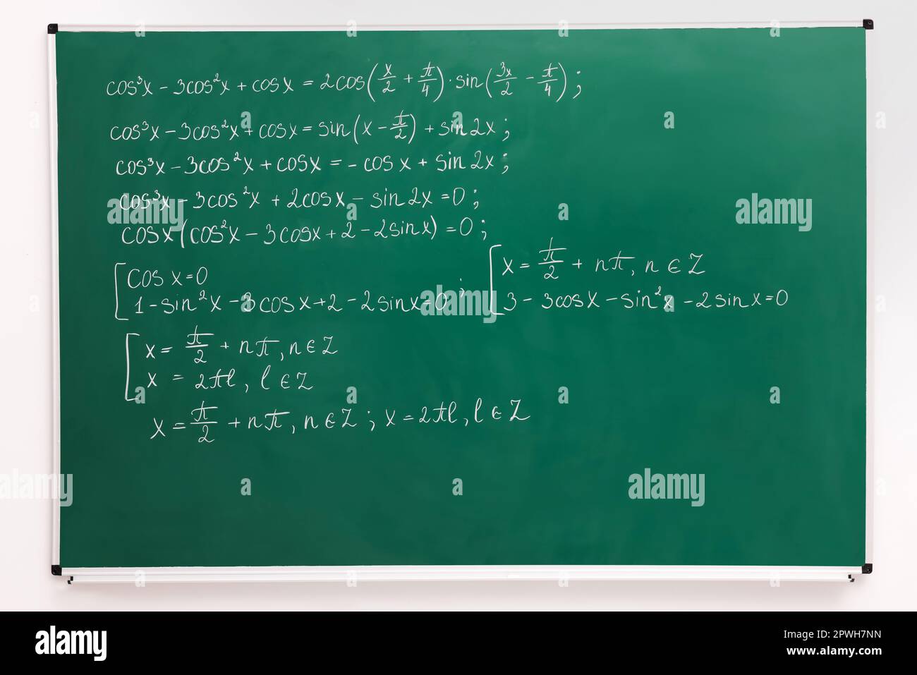 Many different math formulas written on green chalkboard Stock Photo - Alamy