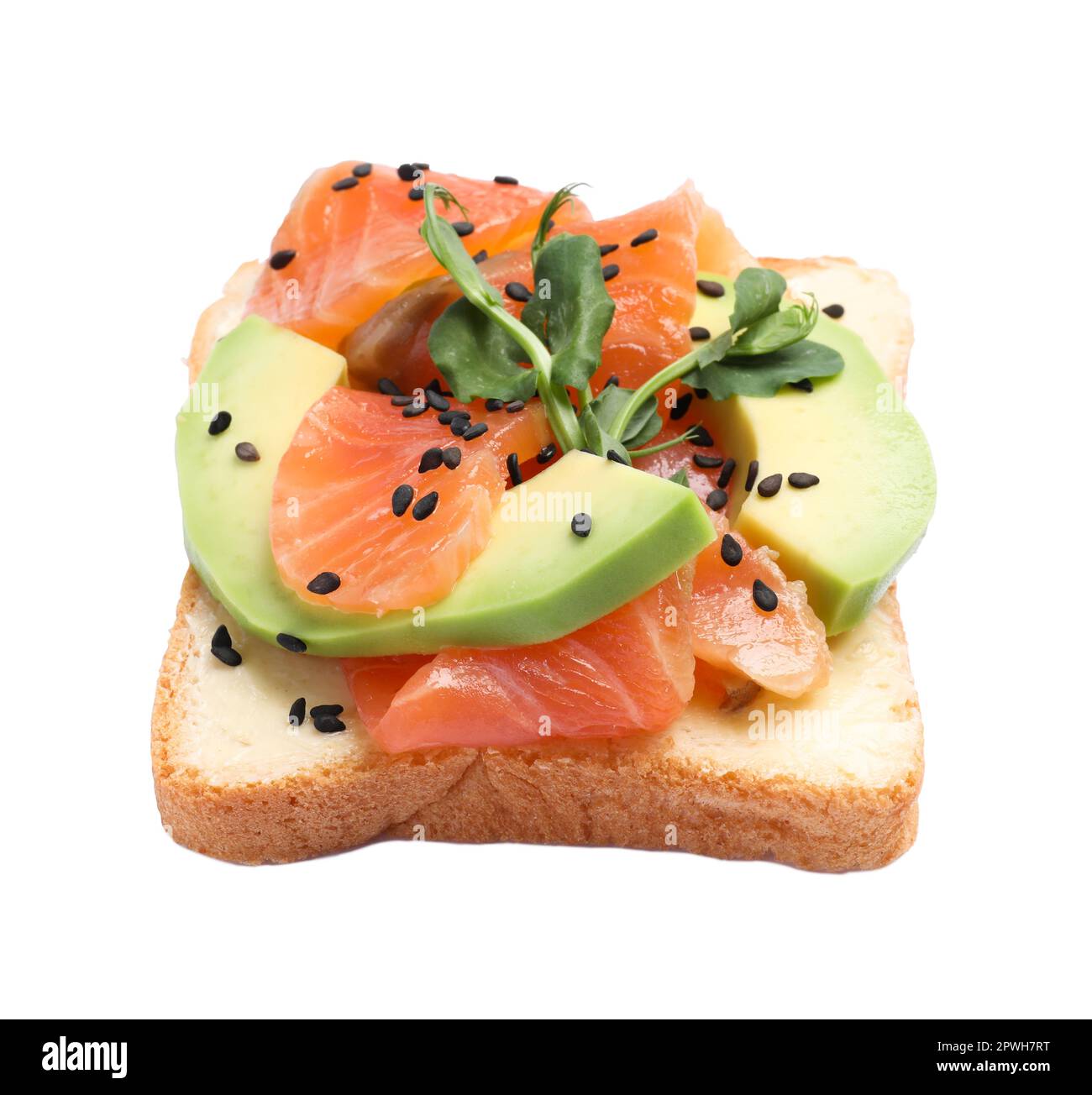 Tasty toast with butter, avocado, salmon, sesame seeds and microgreens ...