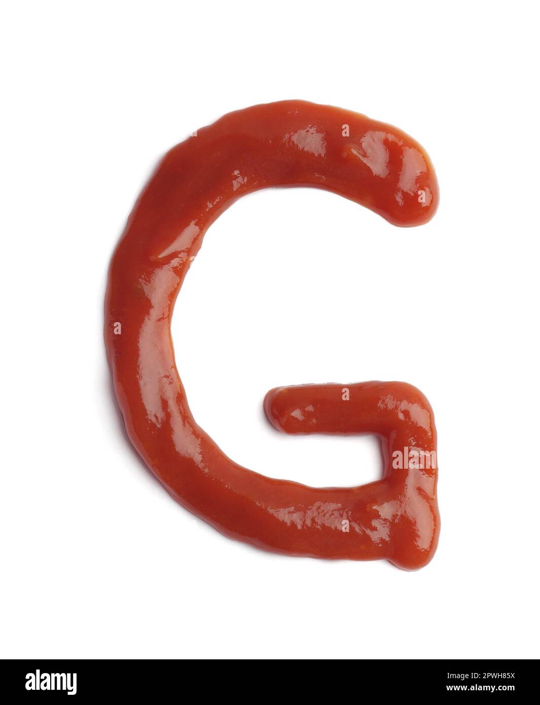 Letter G written with ketchup on white background Stock Photo - Alamy