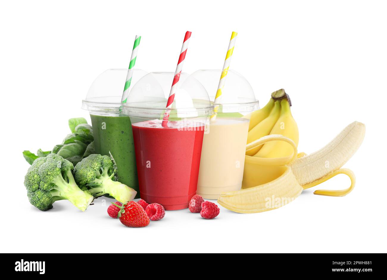 Different delicious smoothies in plastic cups on white background Stock ...