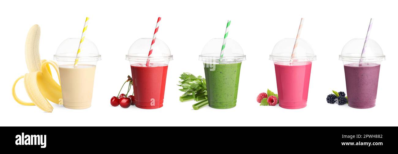Different delicious smoothies in plastic cups on white background ...