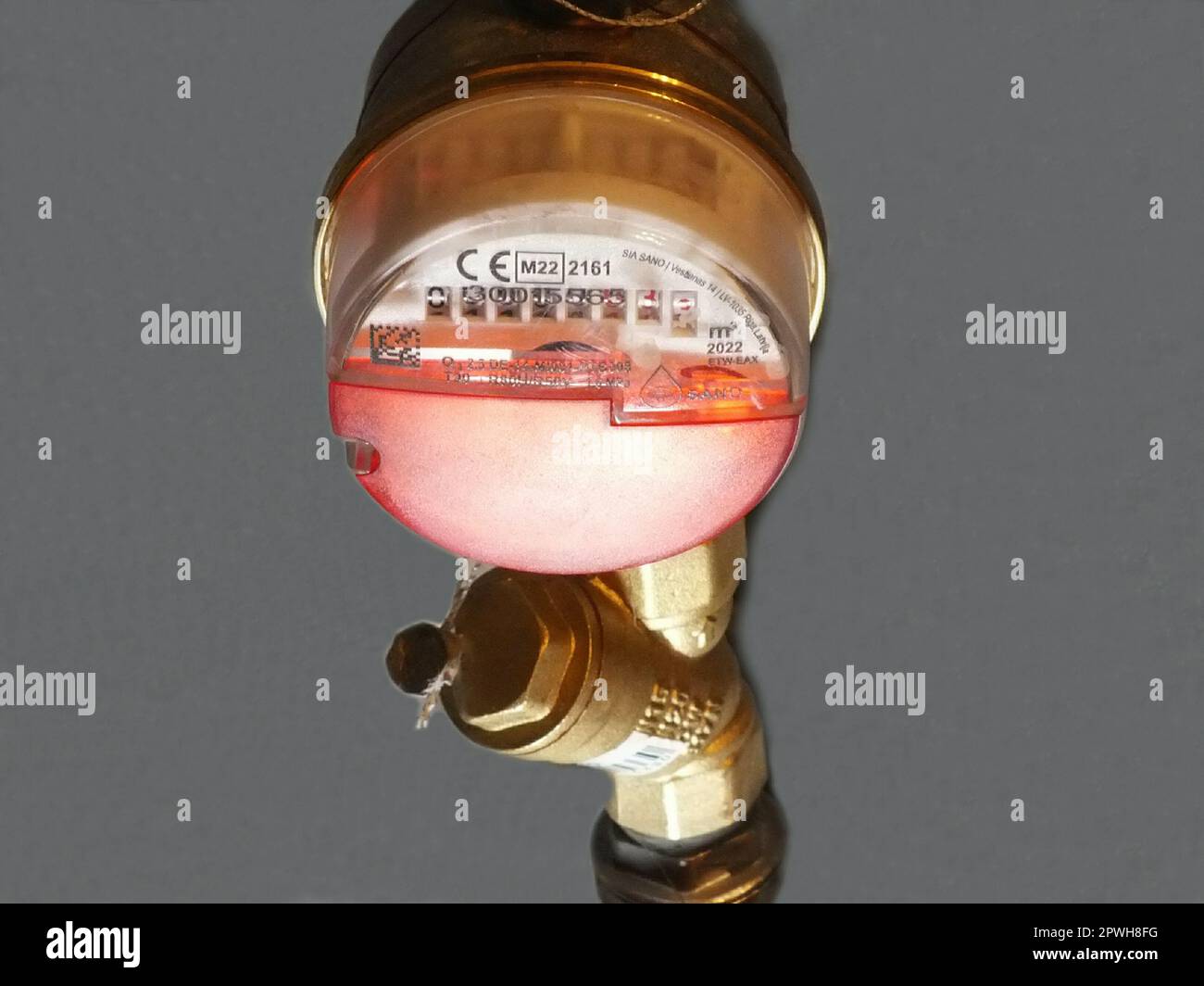 Hot water meter on the wall in the apartment Stock Photo - Alamy