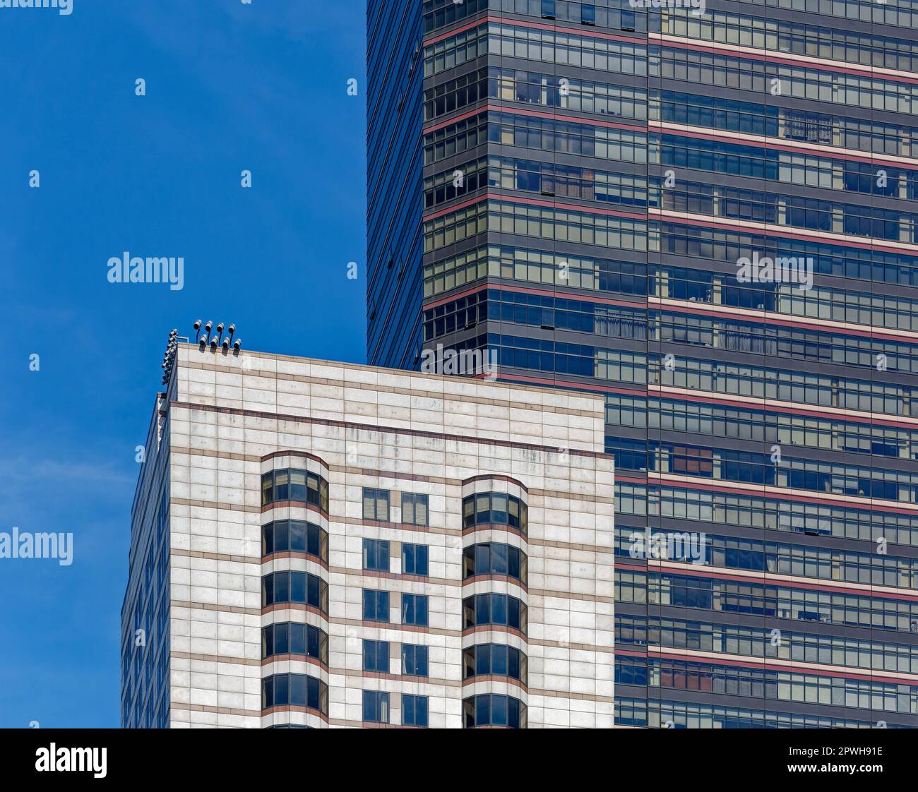Three Lincoln Center is a 54-story black glass condo tower with red ...