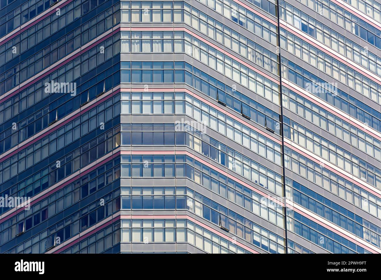 Three Lincoln Center is a 54-story black glass condo tower with red ...