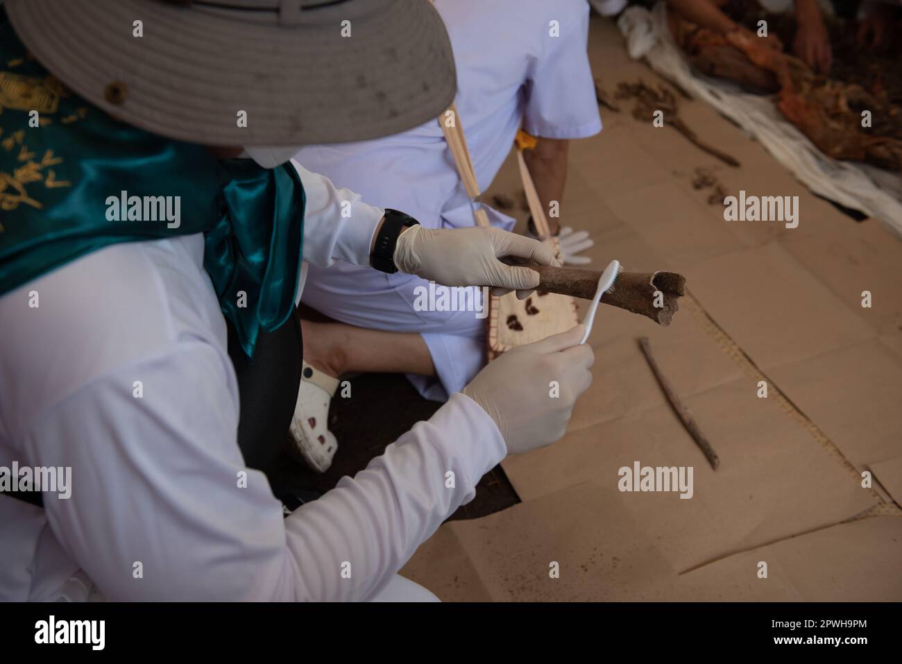 Saraburi, Thailand. 30th Apr, 2023. Volunteers clean human skeletons ...