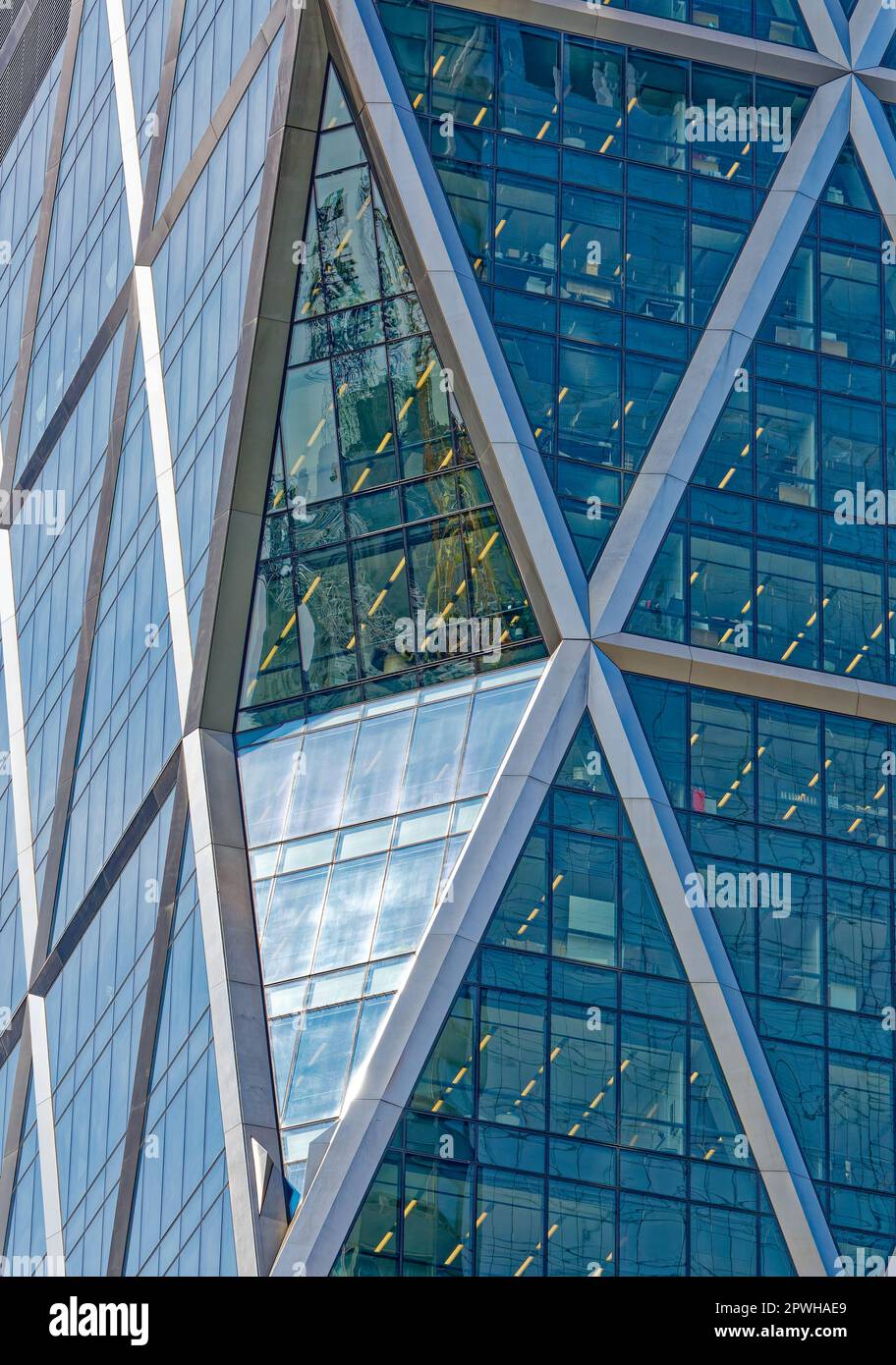 Detail, Hearst Building. The triangular-faceted diagrid tower of 2006 ...