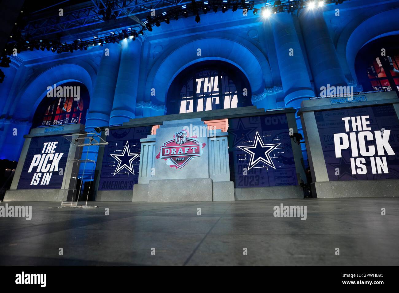 The onstage video screens display "The Pick Is In" for the Dallas ...