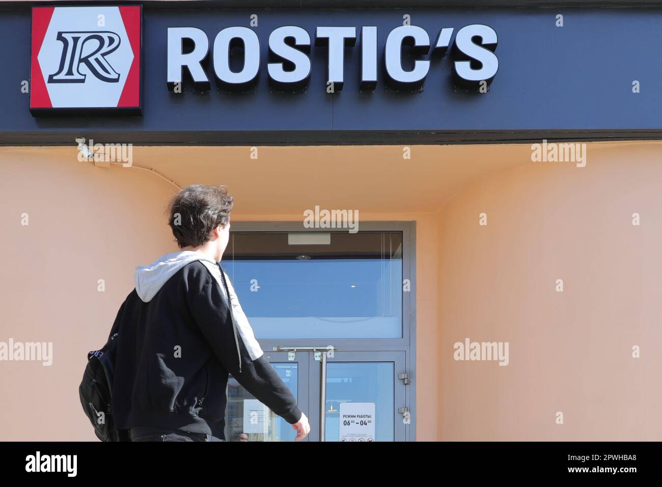 April 04.2023. Russia. Moscow. A man at the fast food restaurant Rostic ...