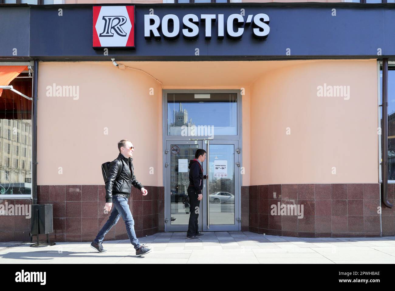 April 04.2023. Russia. Moscow. A man at the fast food restaurant Rostic ...