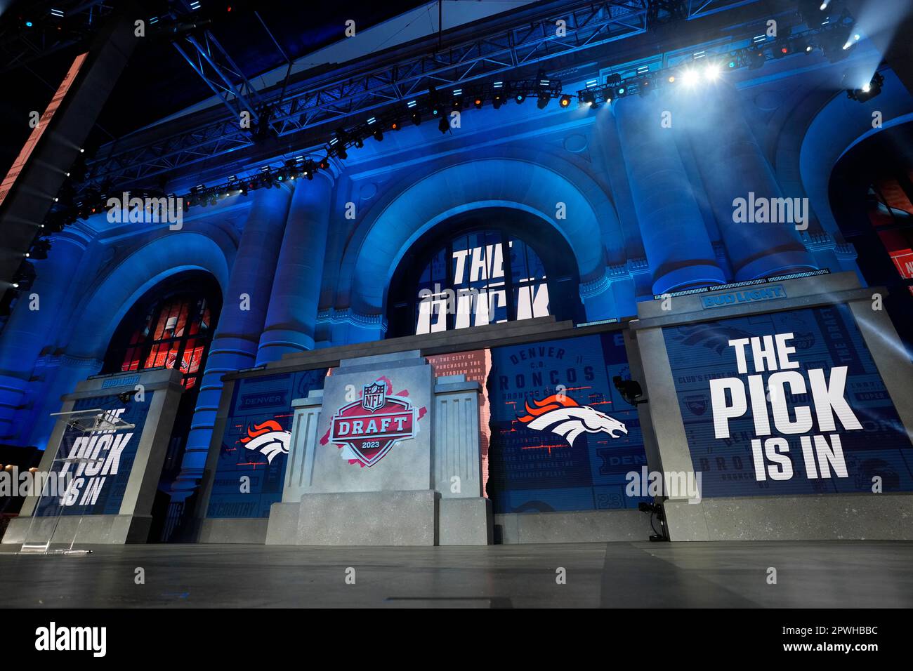 The onstage video screens display "The Pick Is In" for the Denver ...