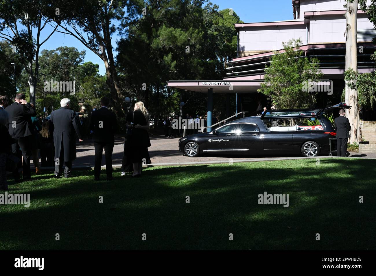 A hearse is seen during the memorial for paramedic Steven Tougher at ...