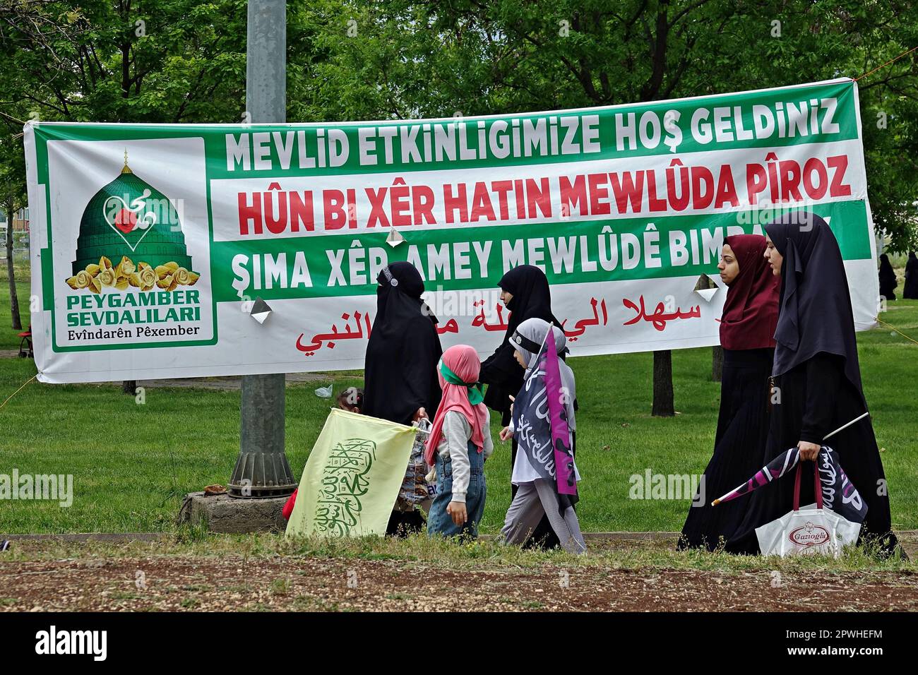Kurdish, Turkish and Arabic language banners that says "Welcome to the ...