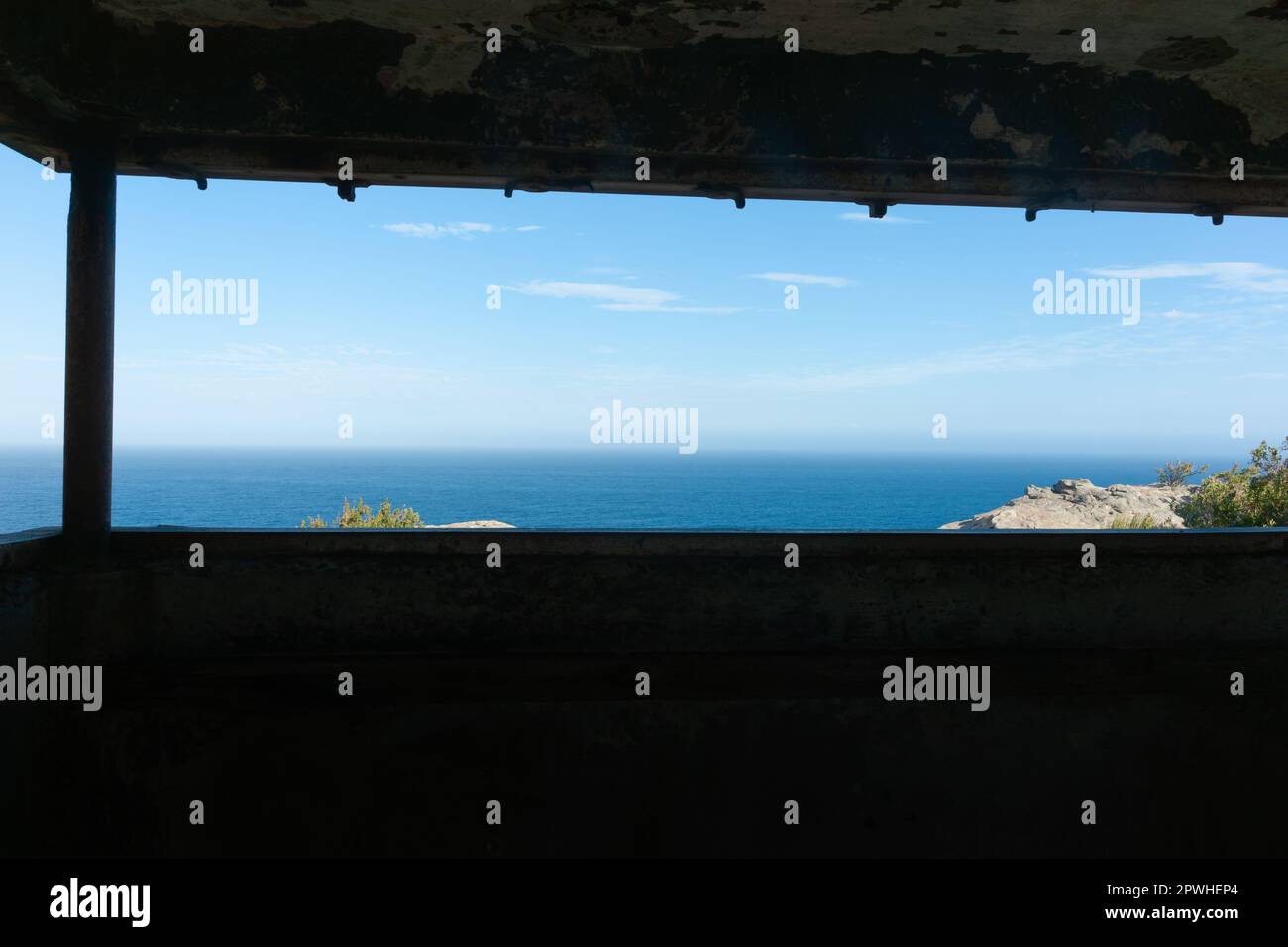 Landscape View through slot in gun emplacement to ocean and horizon ...
