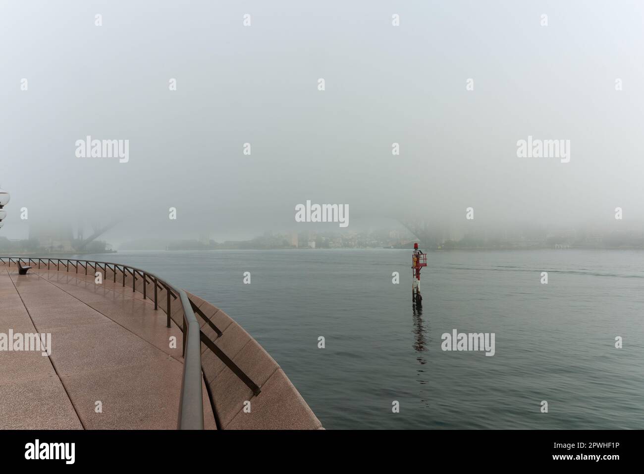 Mist shrouds Sydney harbour in morning light, Australia Stock Photo - Alamy